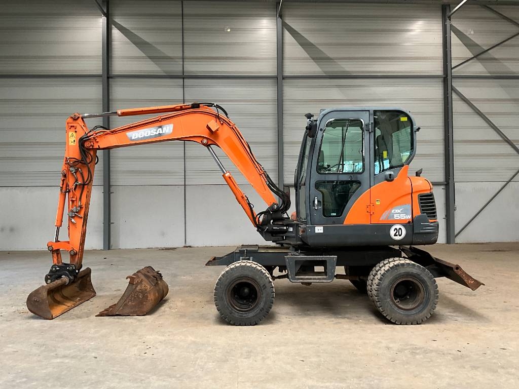 Doosan DX 55 W - Wielgraafmachines - Bouw - Geuens Machinery