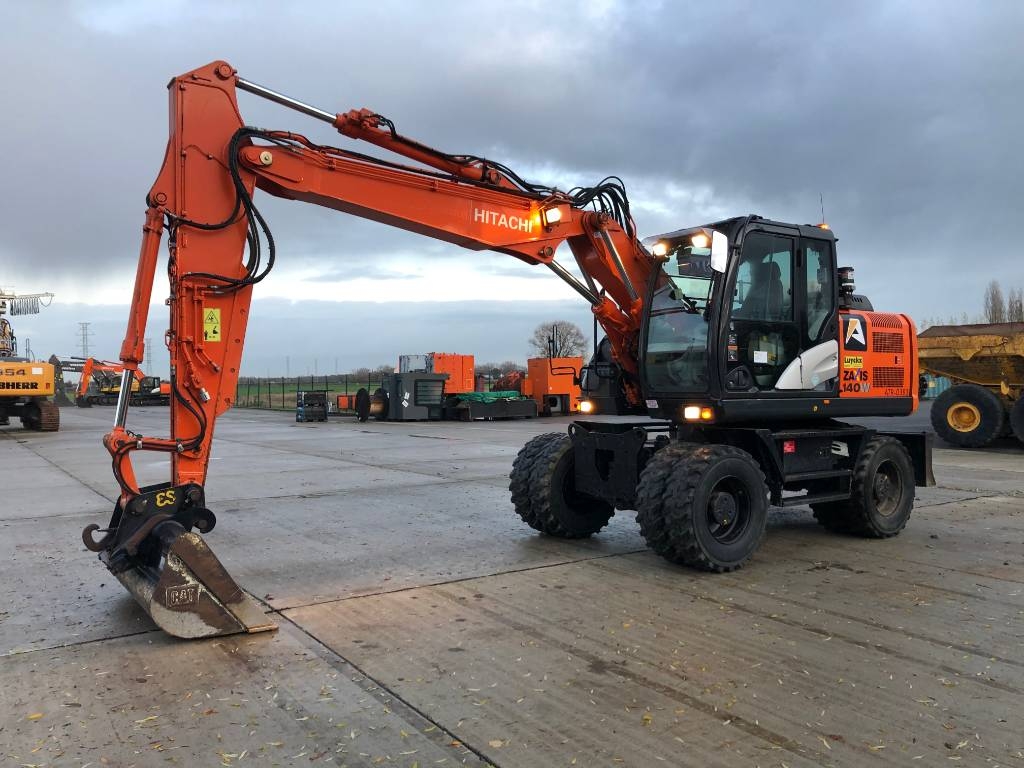 Hitachi ZX 140 W T-5 - Wheeled excavators - Construction - Aertssen Trading