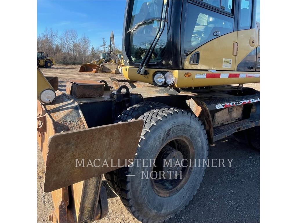 Caterpillar M318D - escavadeiras de rodas - Equipamentos Construção ...