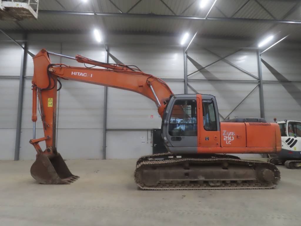 Hitachi ZX 210 LC - Crawler excavators - Construction - Geuens Machinery