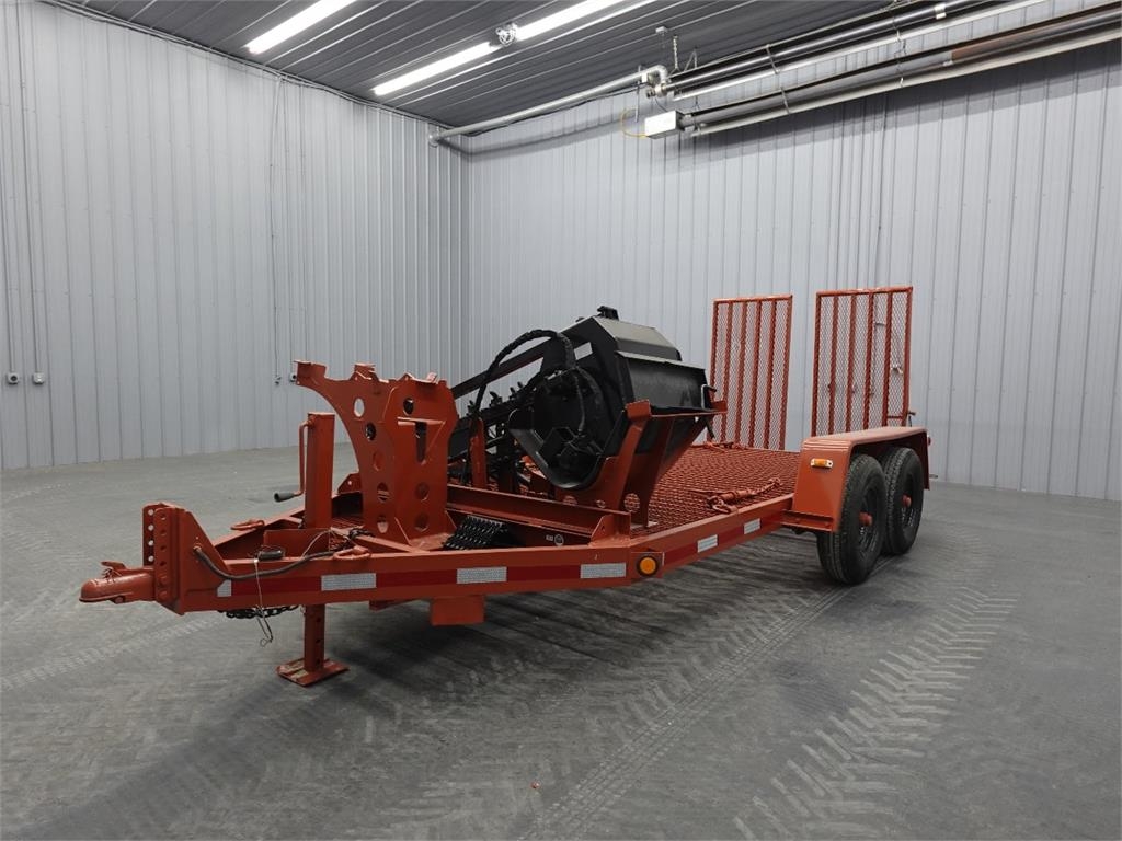 Ditch Witch trailer with attachments