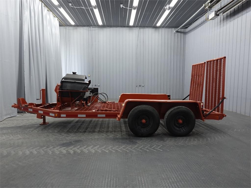 Ditch Witch trailer with attachments