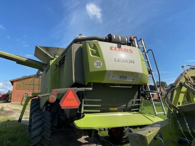 CLAAS LEXION 660 T4I VARIO 930 4 WD / GPS / 11000 L. tan - Combine ...