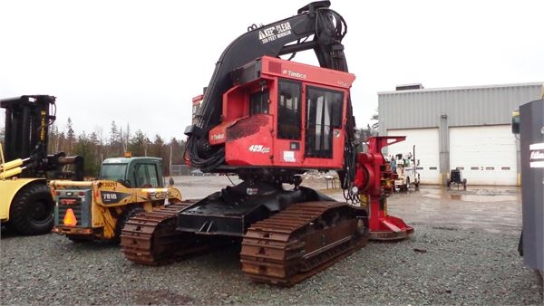 Timbco Feller Buncher Loading A Timbco 445 Feller Buncher In The